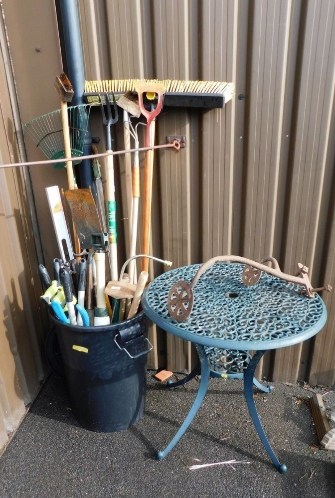 Various garden tools, to include spades, rakes, hoe, and a green cast ...