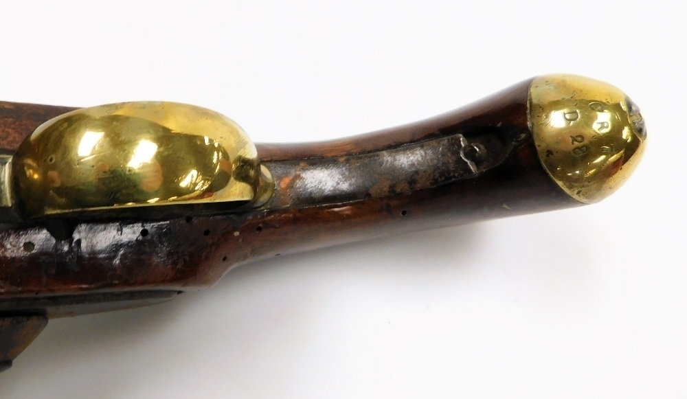 A 19thC percussion pistol, with steel barrel, brass guard, handle cap ...