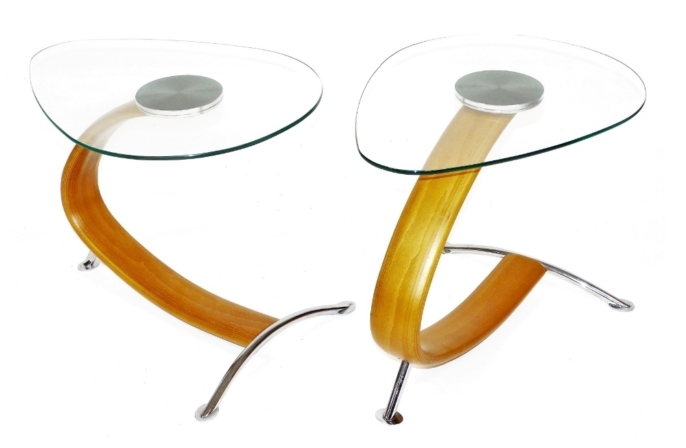 A pair of modern bentwood and glass occasional table, the tier dropped ...