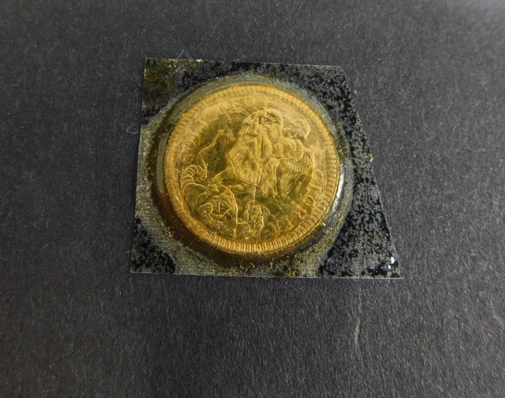 A gold Queen Anne touch piece type coin, cased, with ship and full sail ...
