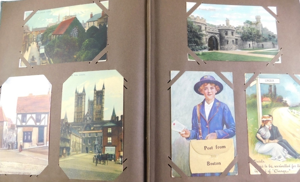 An album containing various early 20thC postcards, to include ...