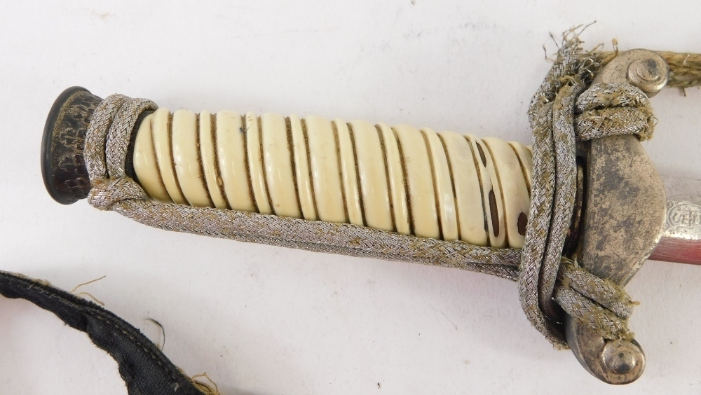 A World War II German Army officer's dagger and scabbard, the plain ...