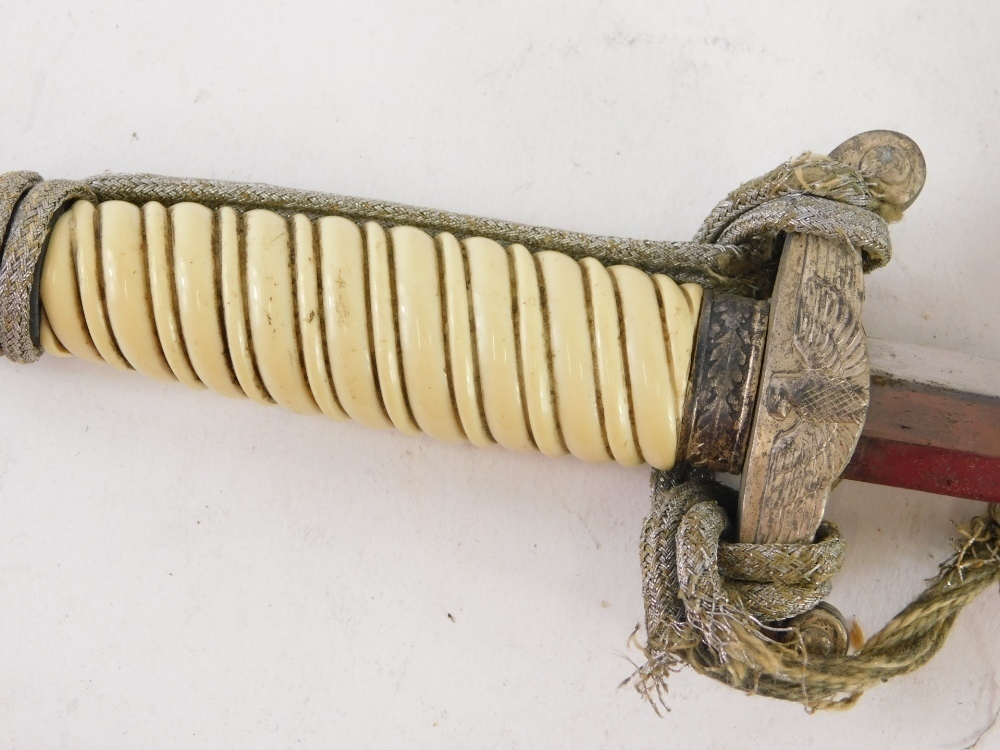 A World War II German Army officer's dagger and scabbard, the plain ...