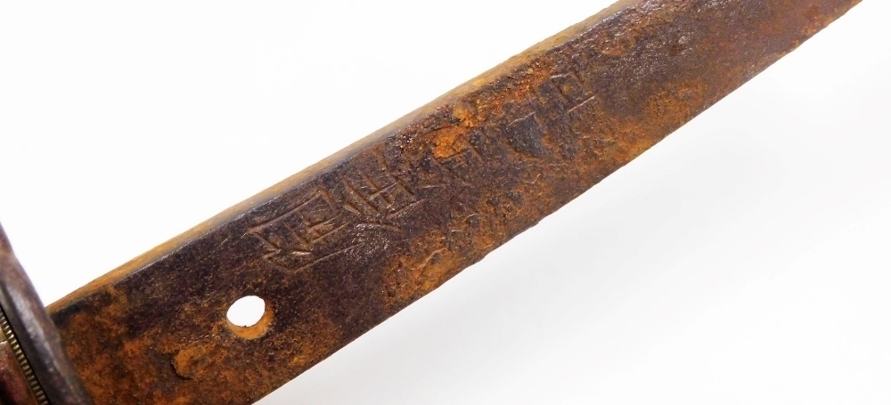 A Japanese katana sword, with bi metal cast pommels, shagreen and cord ...