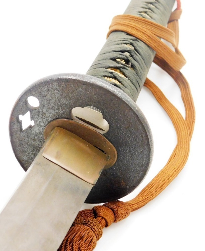 A Japanese katana sword, with plain pommels, shagreen and cord bound ...