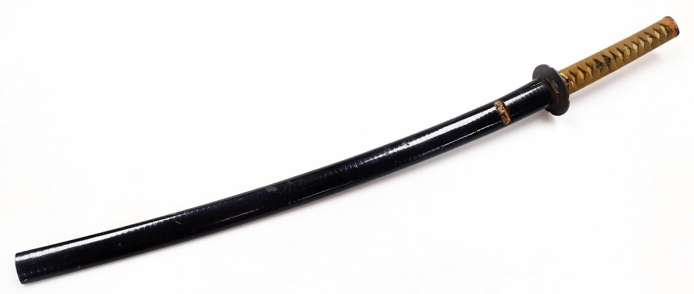 A Japanese katana sword, with bi metal cast pommels, shagreen and cord ...
