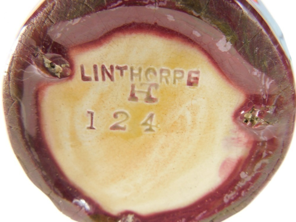 A Linthorpe pottery vase, with inverted stem and bulbous body, marked ...