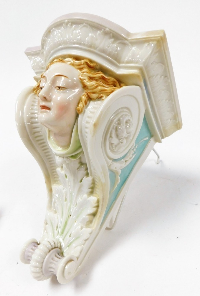 A late 19thC Royal Worcester porcelain wall bracket, modelled with the ...