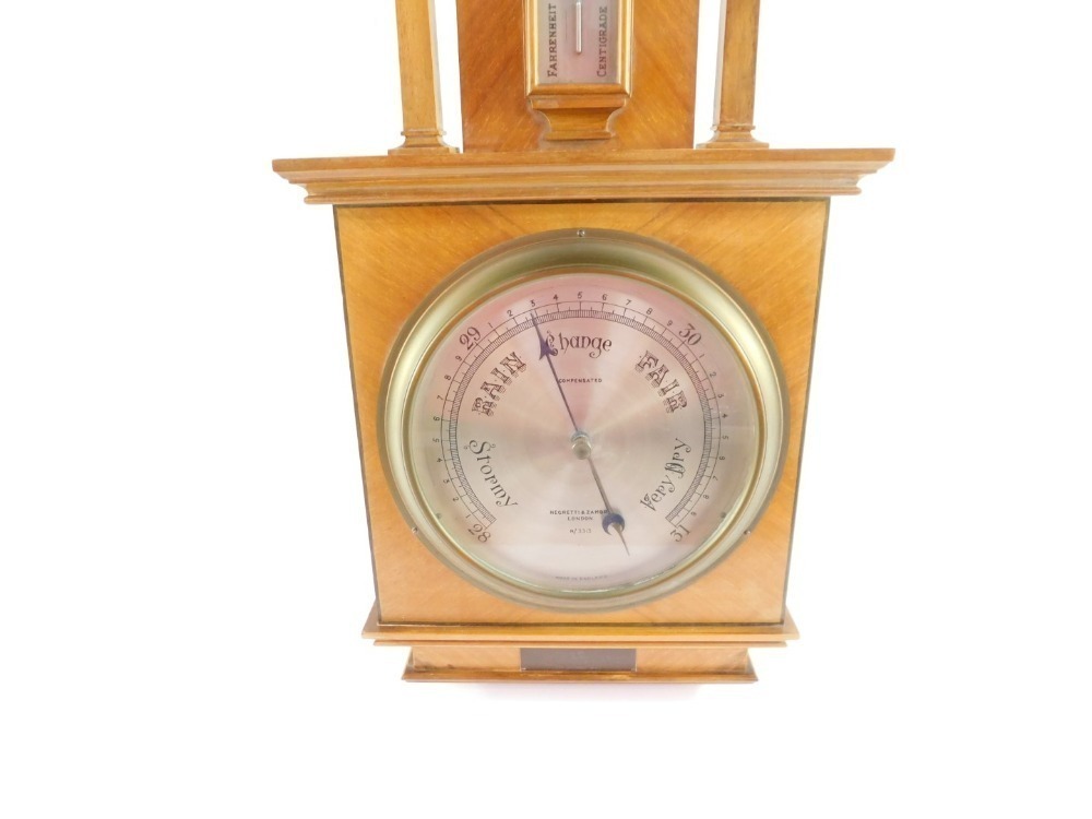 A mid 20thC walnut cased barometer by Negretti & Zambra, London, R/3313 ...