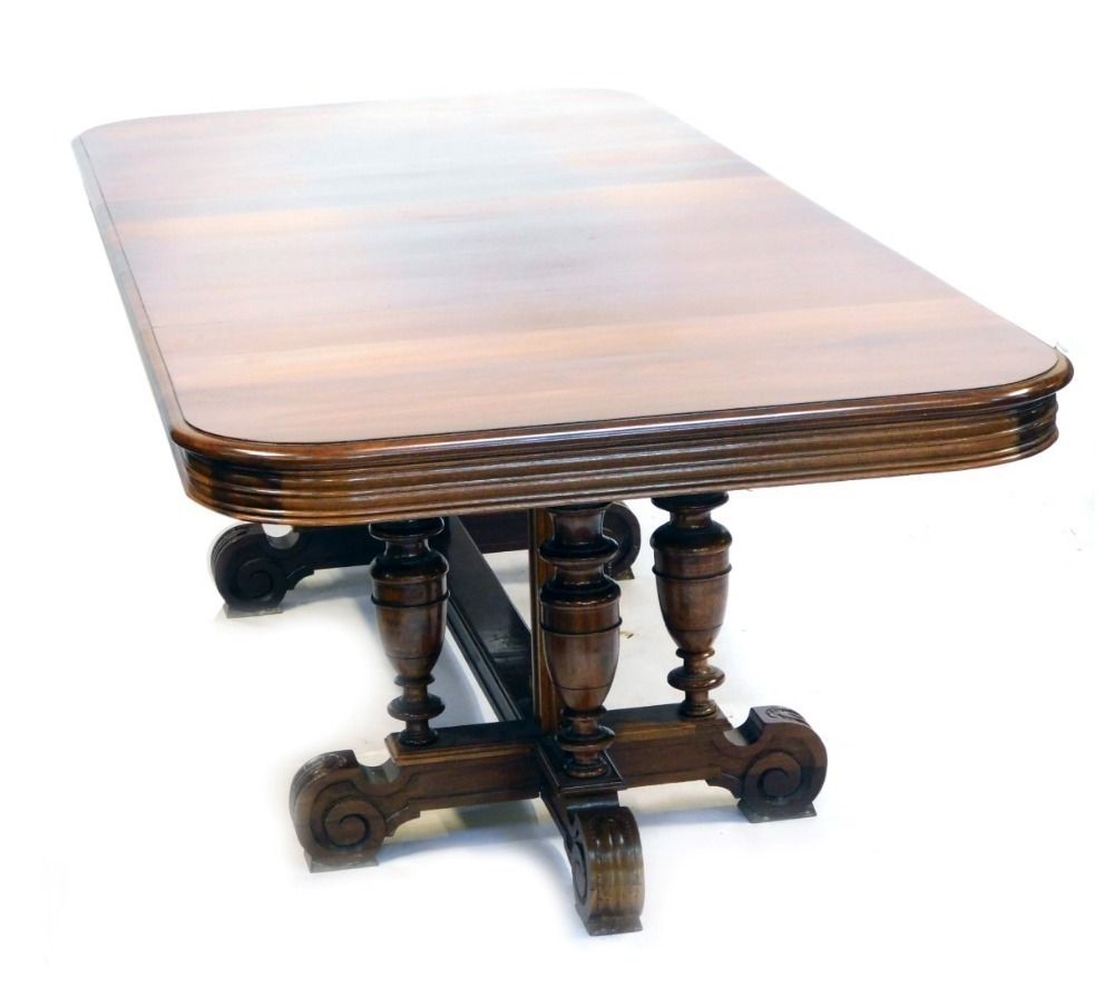 A 19thC Italian walnut dining table, with canted corners, on elaborate ...