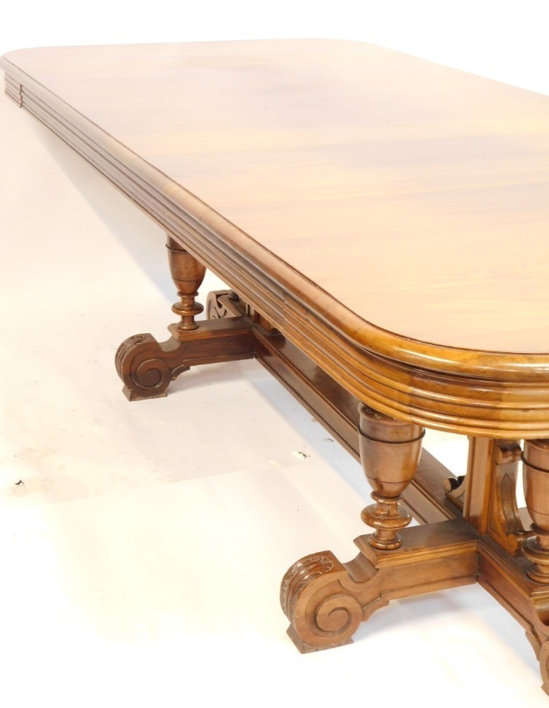 A 19thC Italian walnut dining table, with canted corners, on elaborate ...