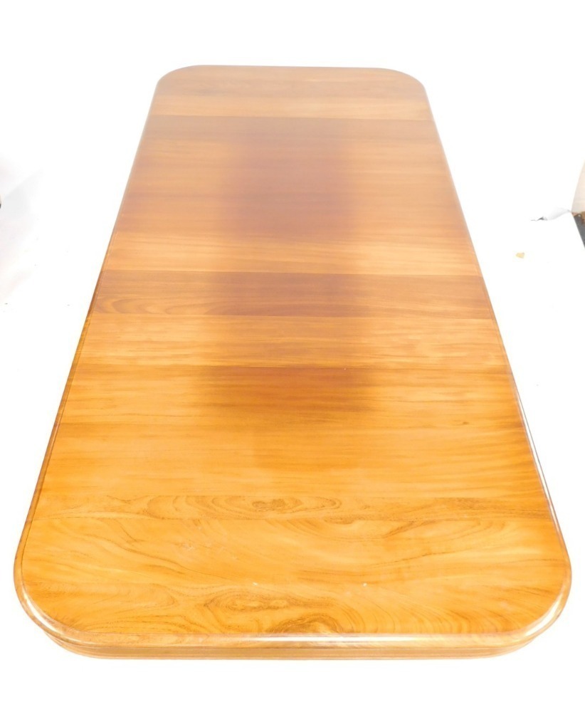 A 19thC Italian walnut dining table, with canted corners, on elaborate ...