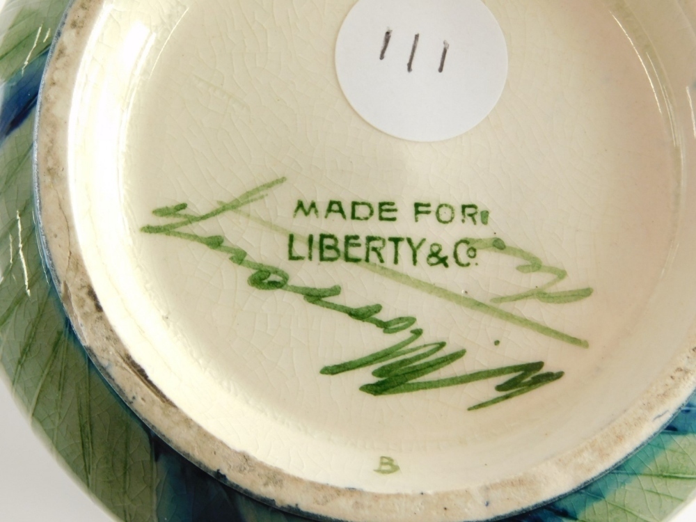 An early 20thC Moorcroft Liberty Florian ware jug, of tapering ...